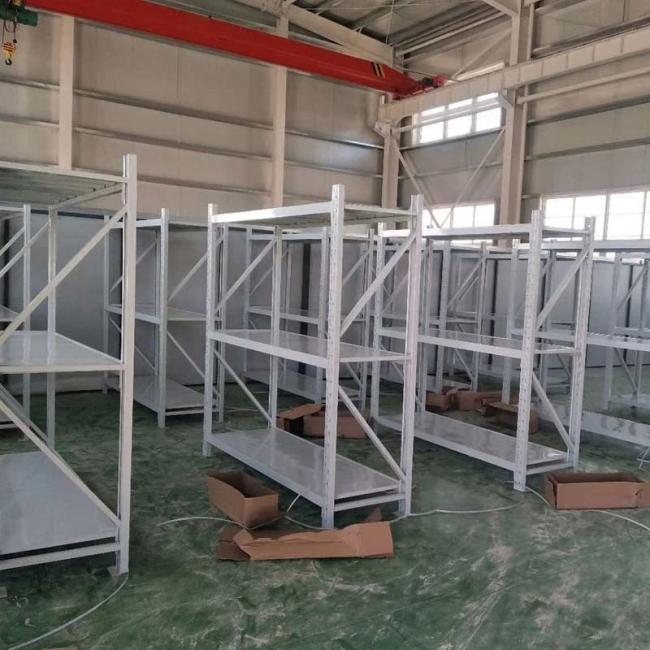 Warehouse rack loaded with storage boxes