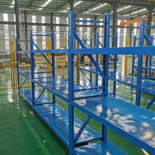 Steel rack with multiple shelves loaded with goods