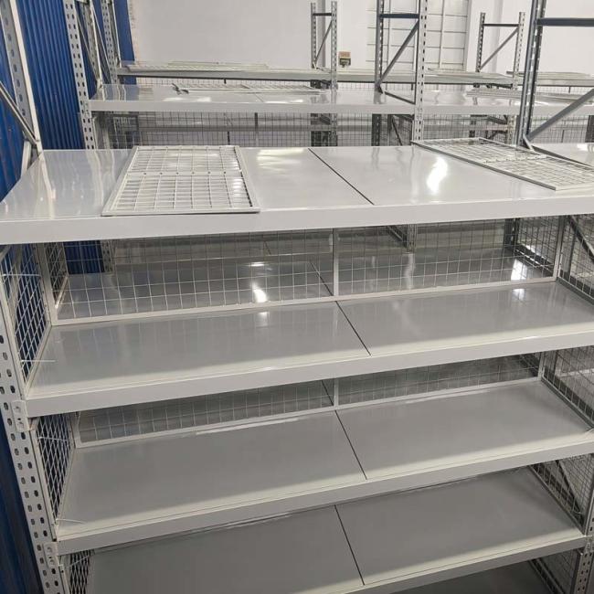 Warehouse installation showing multiple shelving racks in use