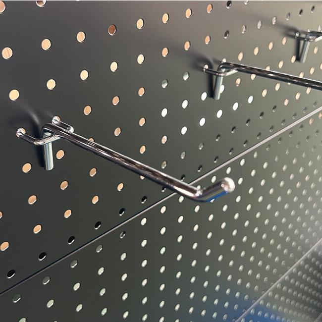 Versatile metal shelving system for retail stores