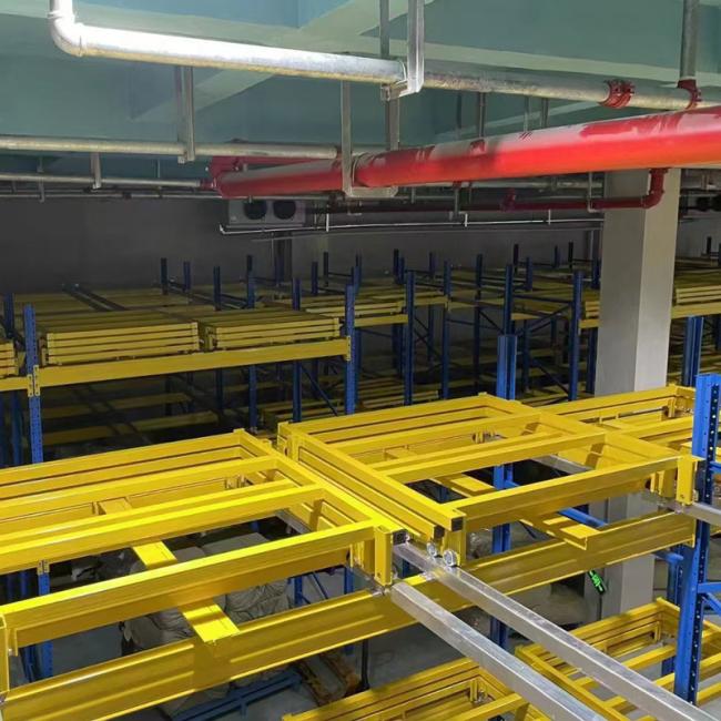 Heavy Duty Push Back Rack System in warehouse setting