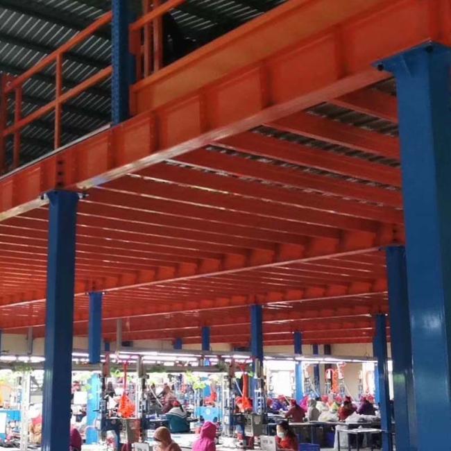 Customizable steel mezzanine floor platform with orange safety rails