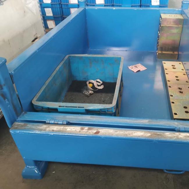 Multiple colored grid material boxes in warehouse