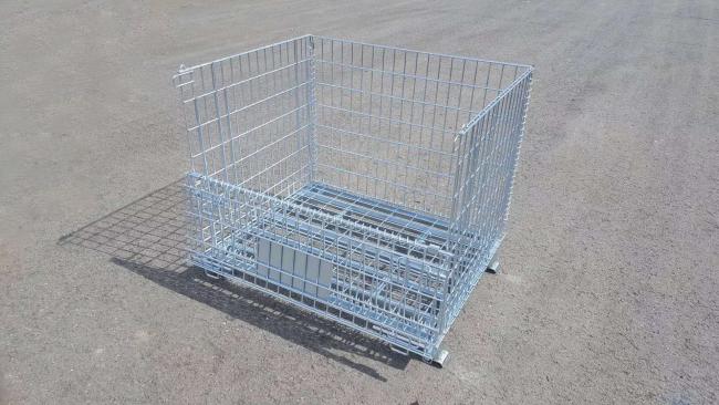 Stacked wire mesh containers in warehouse