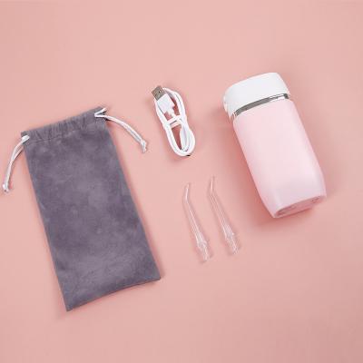 China dentes novos quentes do mini flosser da água que limpam artigos para a venda em Irrigator oral maioria à venda