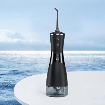 Cina Grande esposizione LCD di nuovo arrivo con 5 il flosser orale dell'acqua del serbatoio di acqua di cura 350ml di punte di modi 6 in vendita