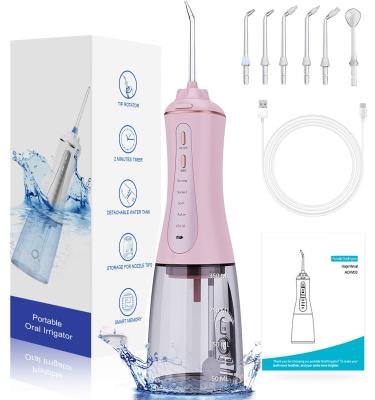 Cina Modi del best-seller 5 di IPX7 Amazon con alta pressione con 6 il irrigator orale della batteria di punte 1800mAh in vendita