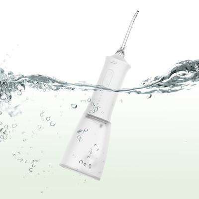 Cina 2000mAh Portable Cordless Rechargeable irrigatore orale elettrico dentale con 4 modalità 350ml grande serbatoio in vendita