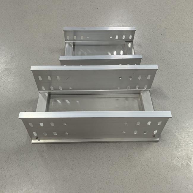 Close-up view of aluminum cable tray construction and mesh pattern