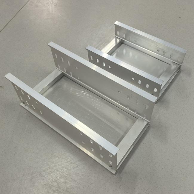 Multiple aluminum cable trays in warehouse setting