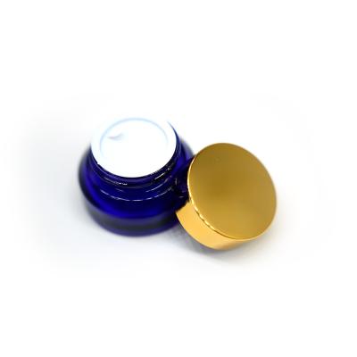 Cina Barattolo di vetro dei cosmetici blu di Hanya Glass Lotion Bottles 30g 50g in vendita