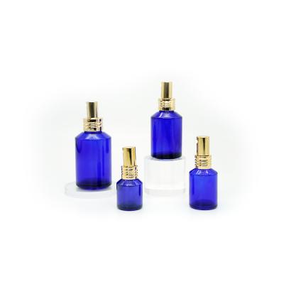 Cina Barattolo di vetro dei cosmetici blu di Hanya Glass Lotion Bottles 30g 50g in vendita