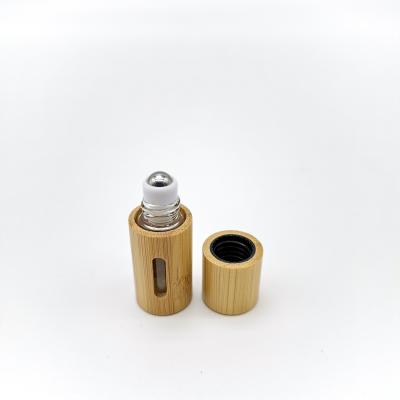 Cina 1ml 2ml Mini Perfume Aromatherapy Glass Roll sulle bottiglie Shell di legno in vendita