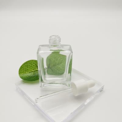 Cina Bottiglie di vetro cosmetiche trasparenti della lozione del quadrato con il contagoccia 1oz 2oz in vendita