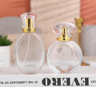 China SGS Round Transparent Perfume Bottle 50ml 60ml Glass Cologne Bottles for sale