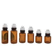China Plastic Cap 10ml Amber Glass Roller Bottles For Essential Oils Refillable for sale