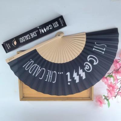 China 23cm Stock  Wooden Polyester Contton Wood Handle Folding Fan for Spain Market Promotion for sale