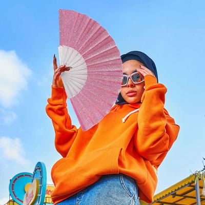 China Custom Portable Scallion Powder Fabric Plastic Hand Fan Folding Hand Held Fan for Activity for sale