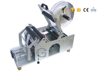 China Semi automatic round bottle sticker labeling machine with collection worktable for sale