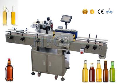 China Self Adhesive Round Bottle Labeling Machine Automatic Oil Vertical Automatic Sticker for sale