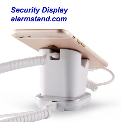 China COMER UNIVERSAL Powerful tablet cellphone secured counter display charging cord alarm sensor stand for sale