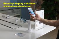 China COMER security gripper mobile phone holder with alarm function and charging for sale
