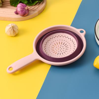 China Multi-Function Round Retractable Fruit Tray Folding Kitchen Washing Basket with Handle Home Use Plastic Fruit Basket for sale
