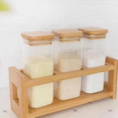 China Multi-Layer Bamboo Wood Seasoning Storage Box Kitchen Table Condiment Rack with Spice Storage for Pot Use for sale