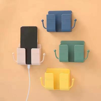 China Multi-functional New Durable Bedroom Kitchen Storage Rack Multi-color Control Board Smartphone Storage Rack for sale