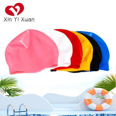 China 60g Comfortable Swimming Cap Water Protective Fall Resistance silicone swimming cap for sale