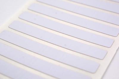 China 50.8x6.35mm Hoogtemperatuur Kleeflabels 1mil Wit Glanzend Polyimide Label Voor Anti-Static Te koop