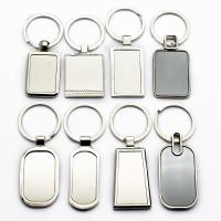 China Customized Plain Metal Keyrings Silver Engravable Key Chains Embossed for sale