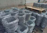 China Electro Galvanized Barbed Wire Double Strand 2.51mm Silver Color Security Fencing for sale